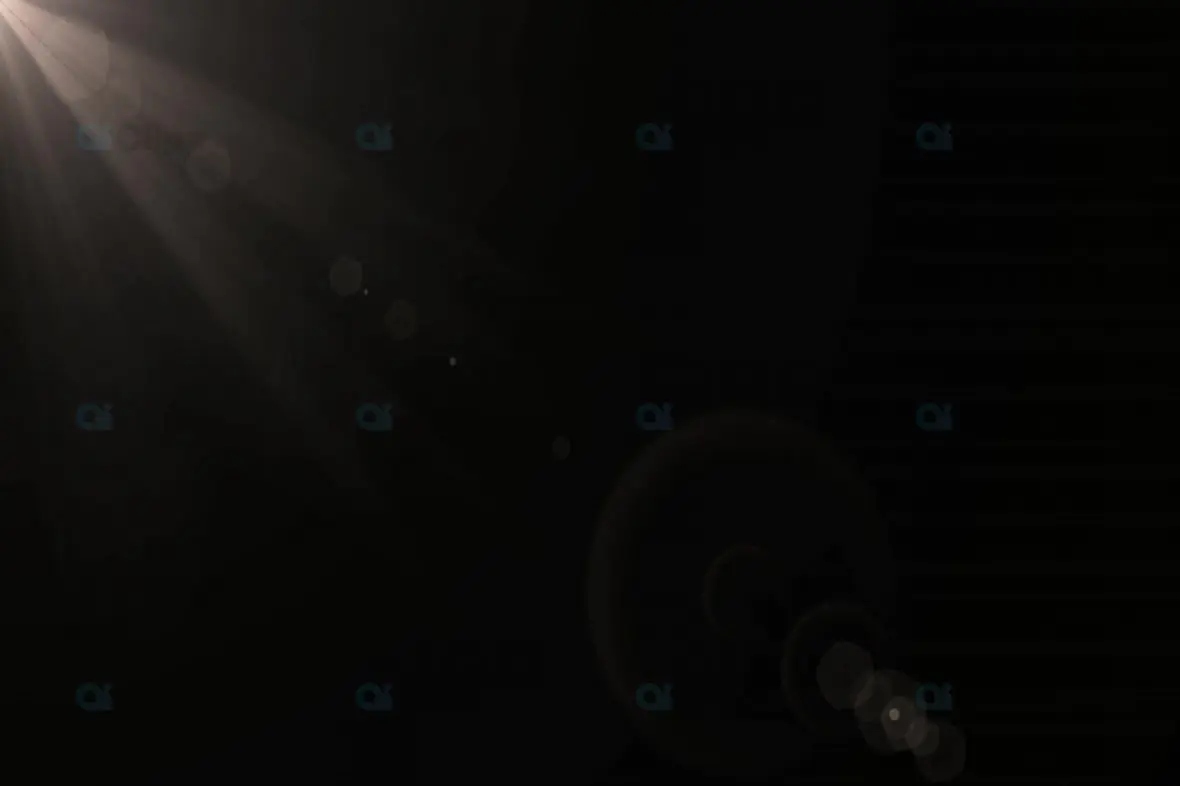 Subtle Light Rays with Lens Flares on Black Background | AIClips